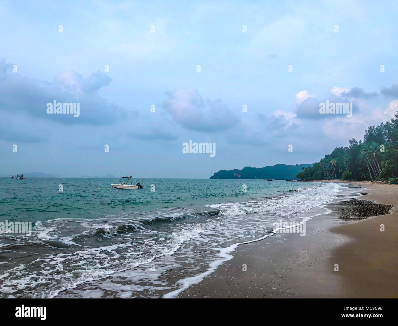 Beach view with boat, image picture Stock Photo - Alamy