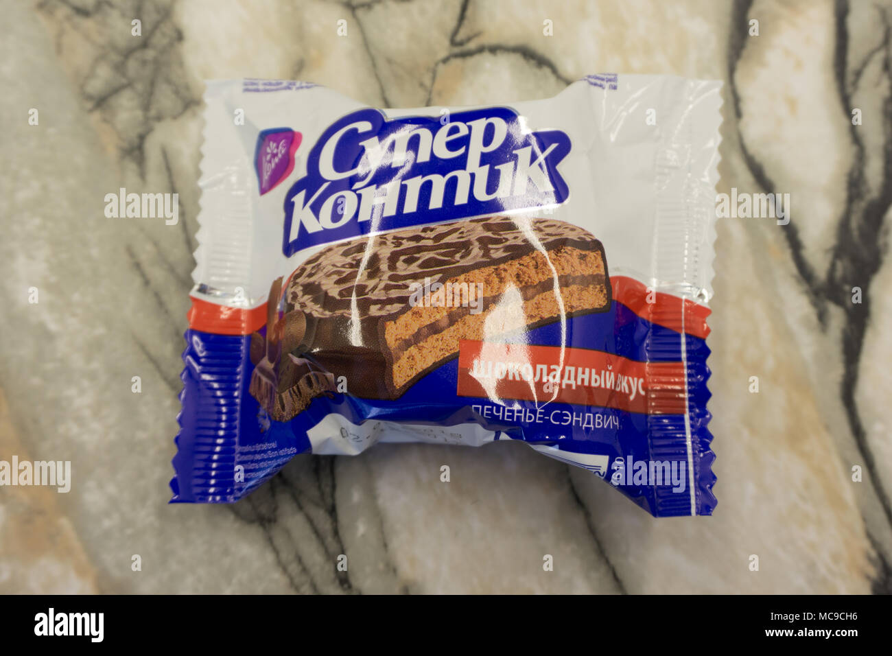 candy Cooper comedian chocolate flavor cookies sandwich on marble ...