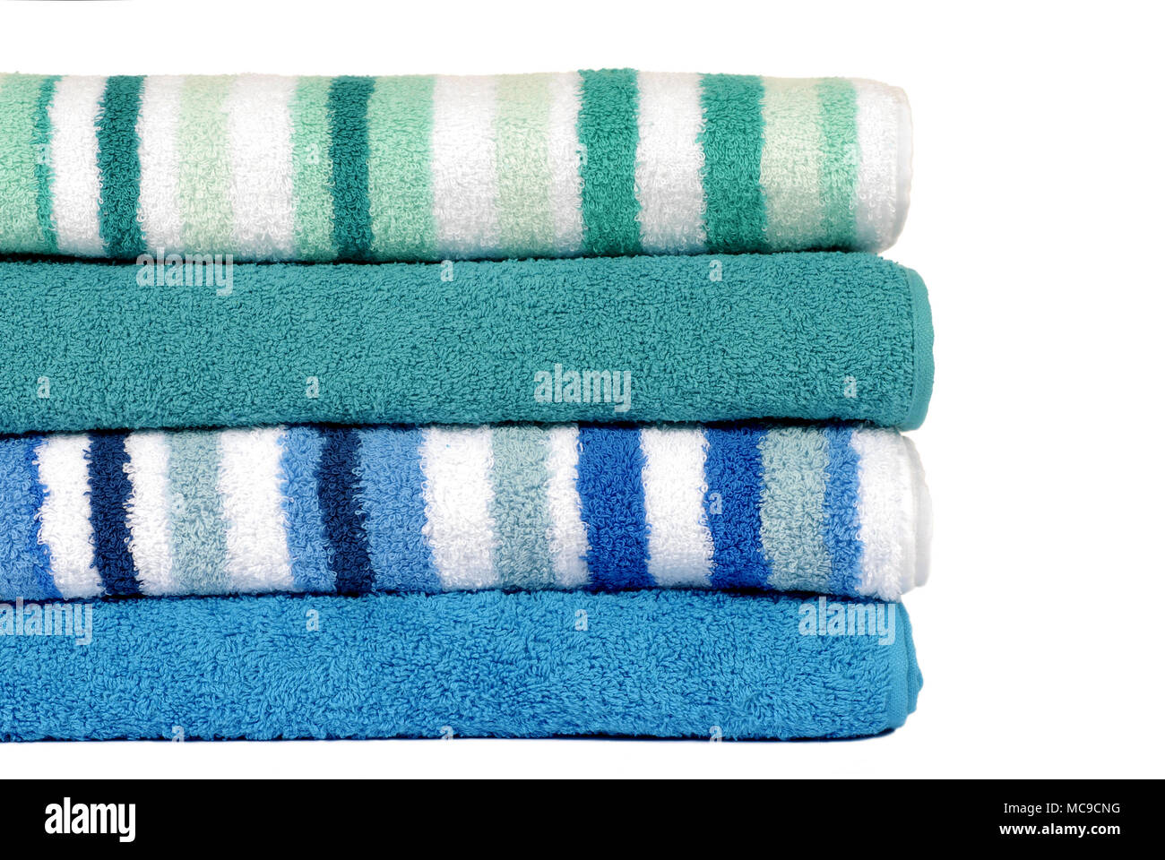 Small stack of bathroom towels isolated on white background Stock Photo ...
