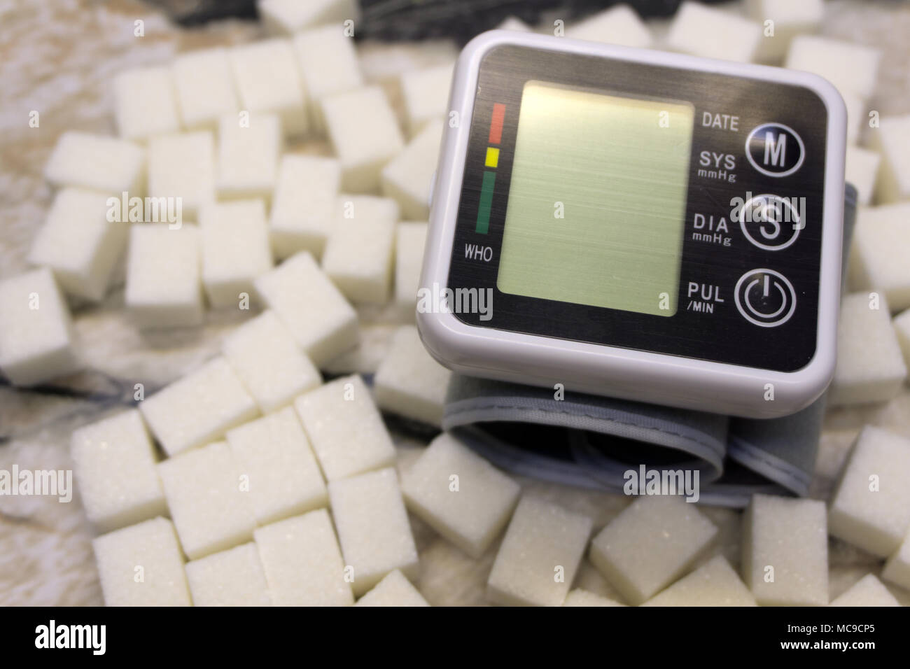 Glucose meter with result of sugar level, blood pressure monitor and ...