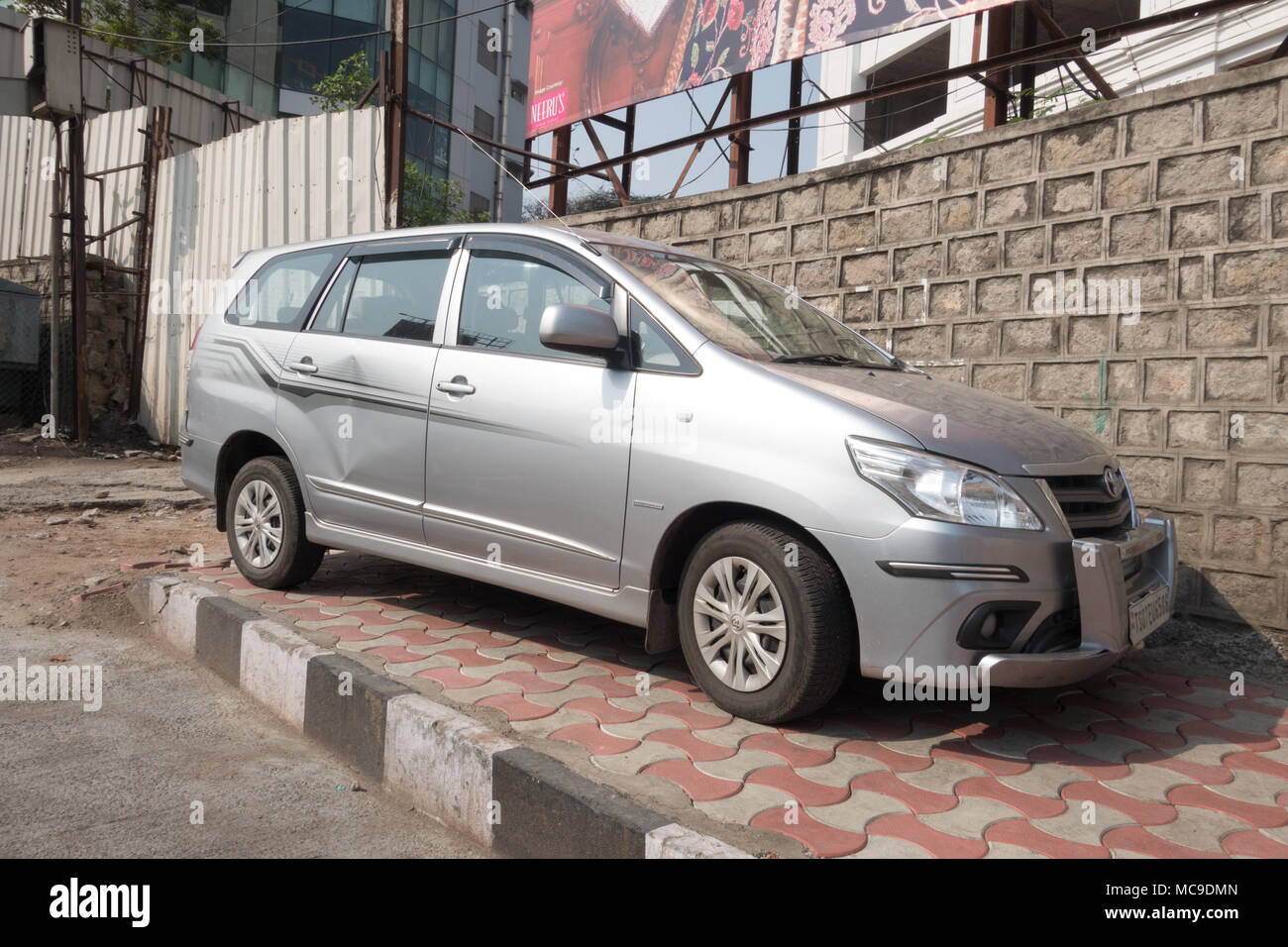 Car parking on footpath hi-res stock photography and images - Alamy
