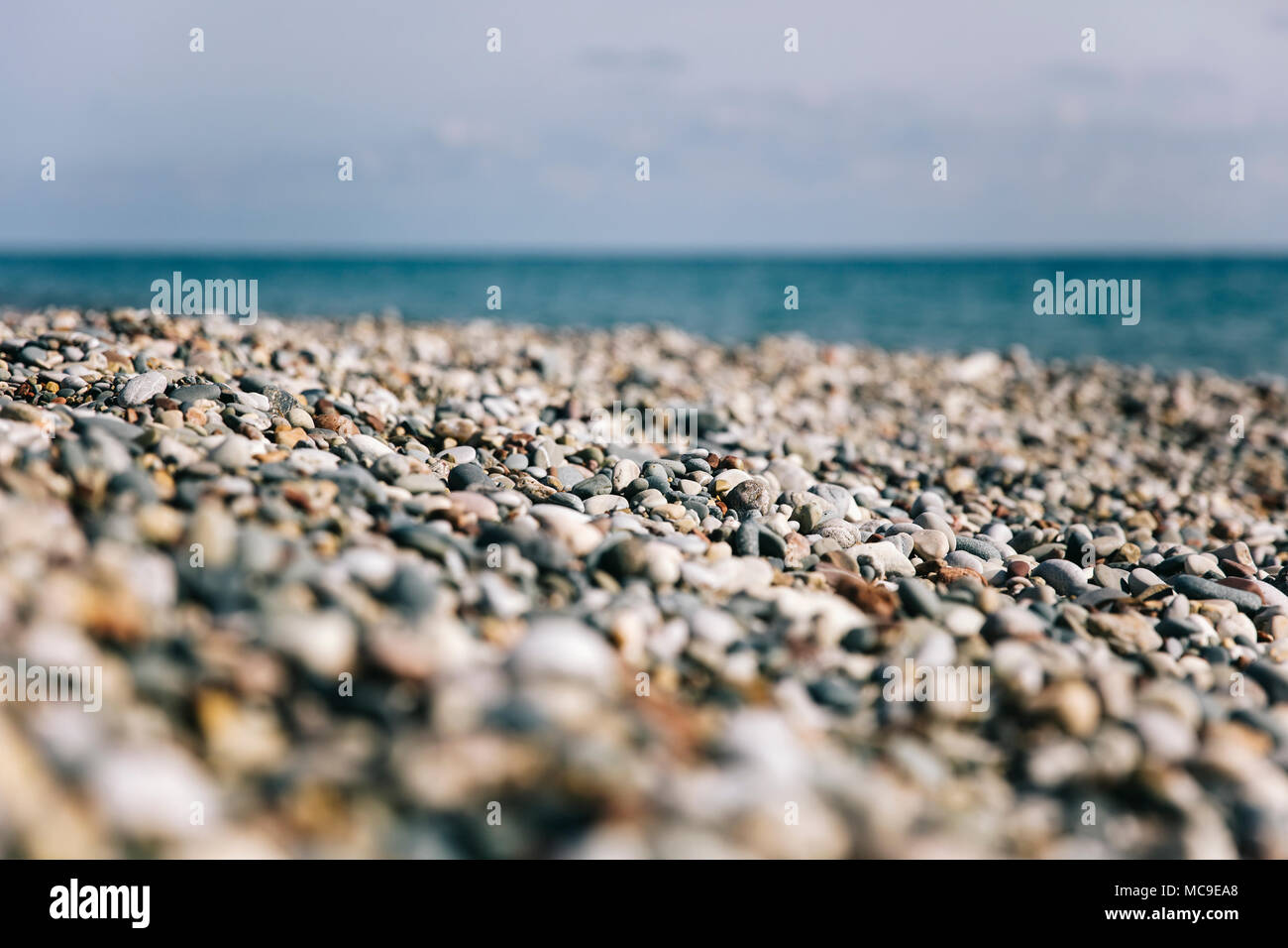 Detail of the cobble stone beach and sea Stock Photo - Alamy