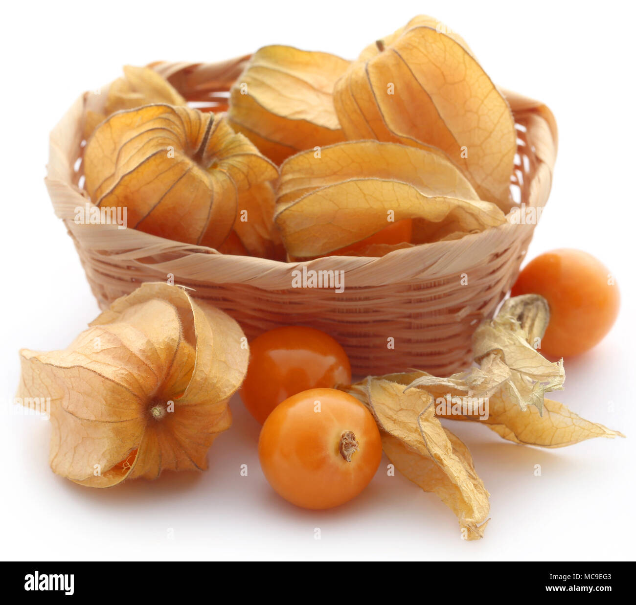 Fresh edible physalis over white background Stock Photo - Alamy