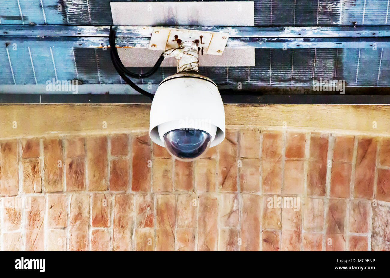 Security CCTV Camera on the old wall Stock Photo - Alamy