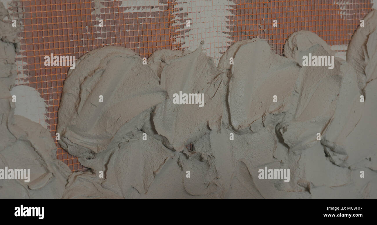 freshly applied plaster on the wall, wide photo Stock Photo - Alamy