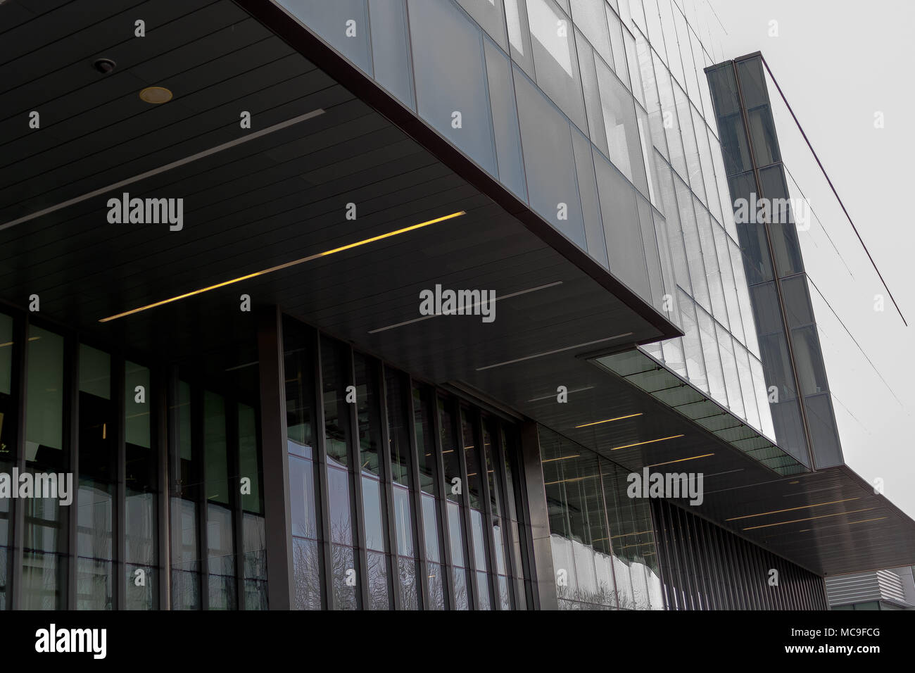 Beautiful modern glass building brighten by natural light Stock Photo ...
