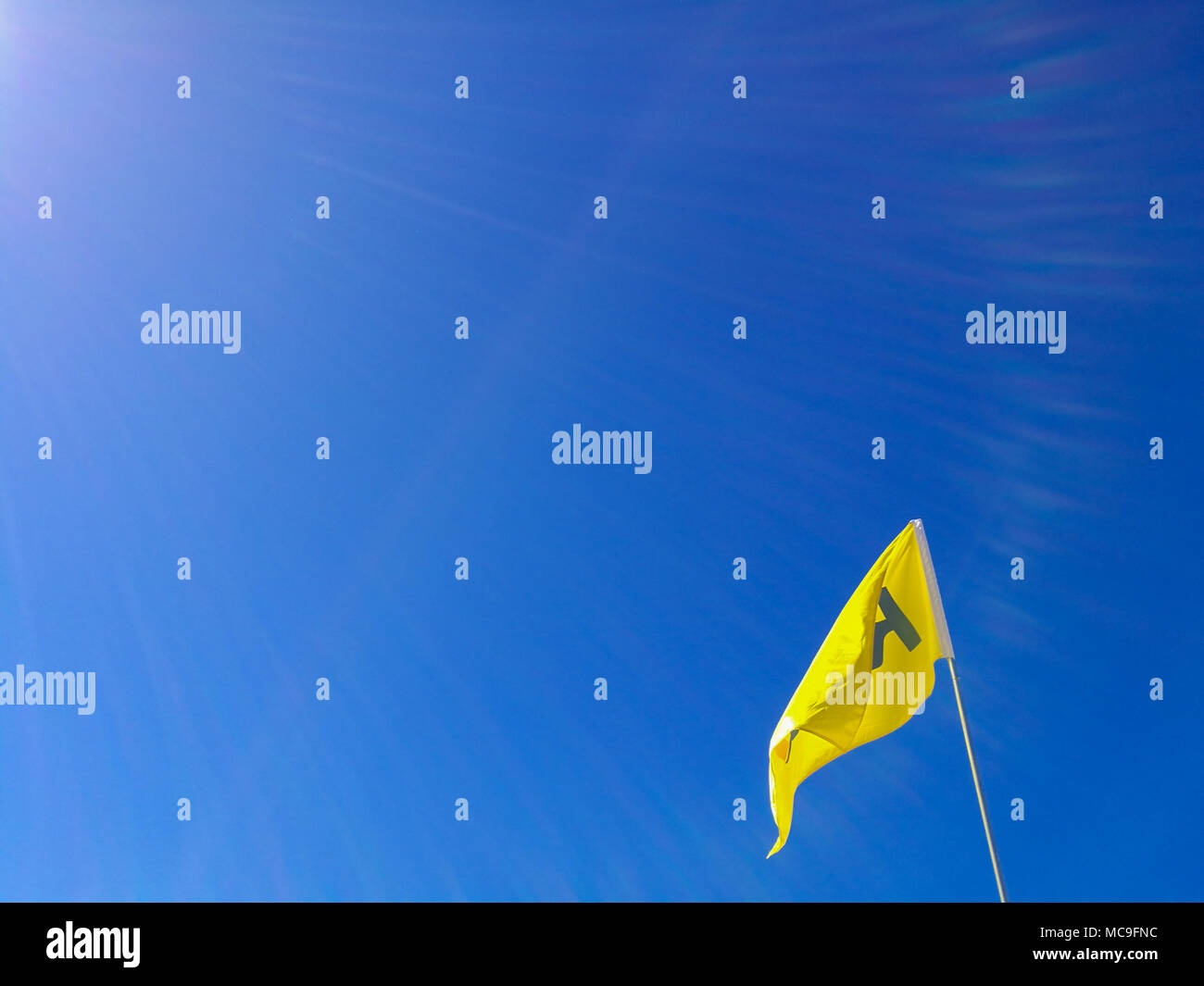 Flag flying plain hi-res stock photography and images - Alamy