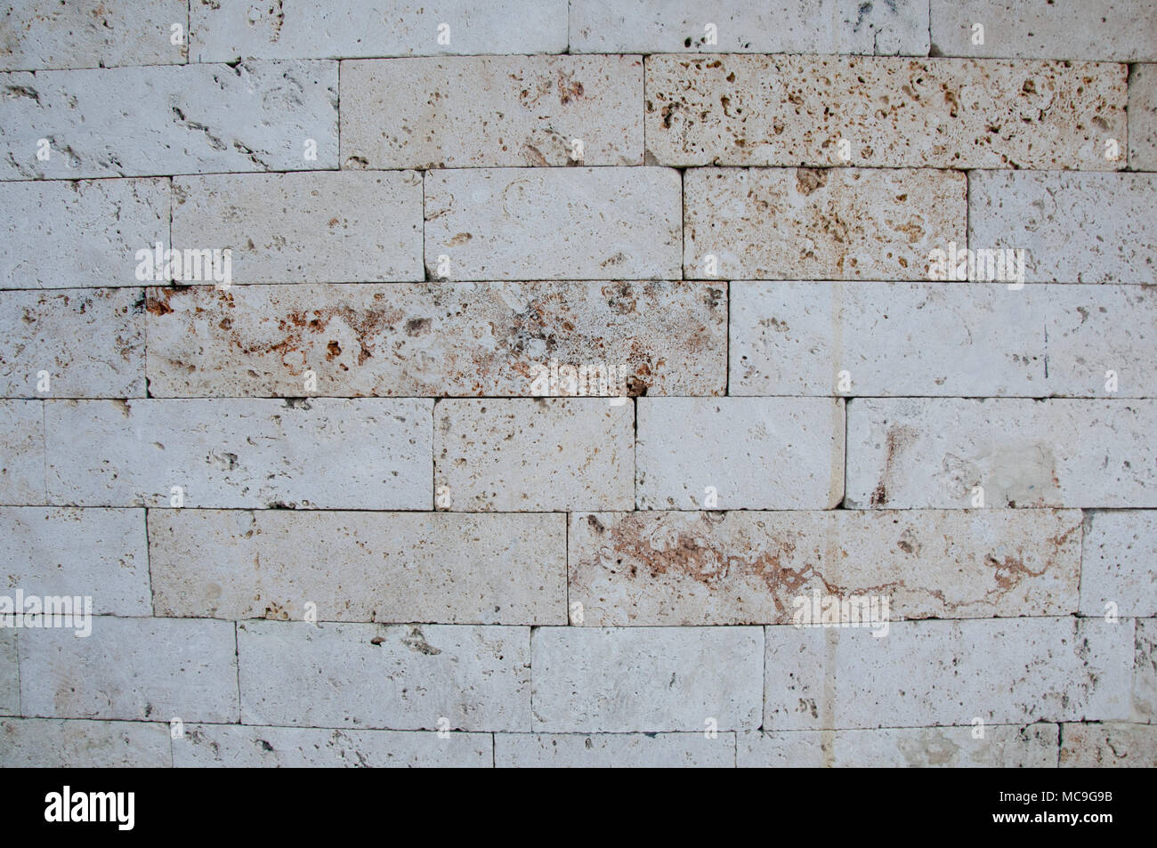 Clean light brown sandstone brick wall background Stock Photo - Alamy