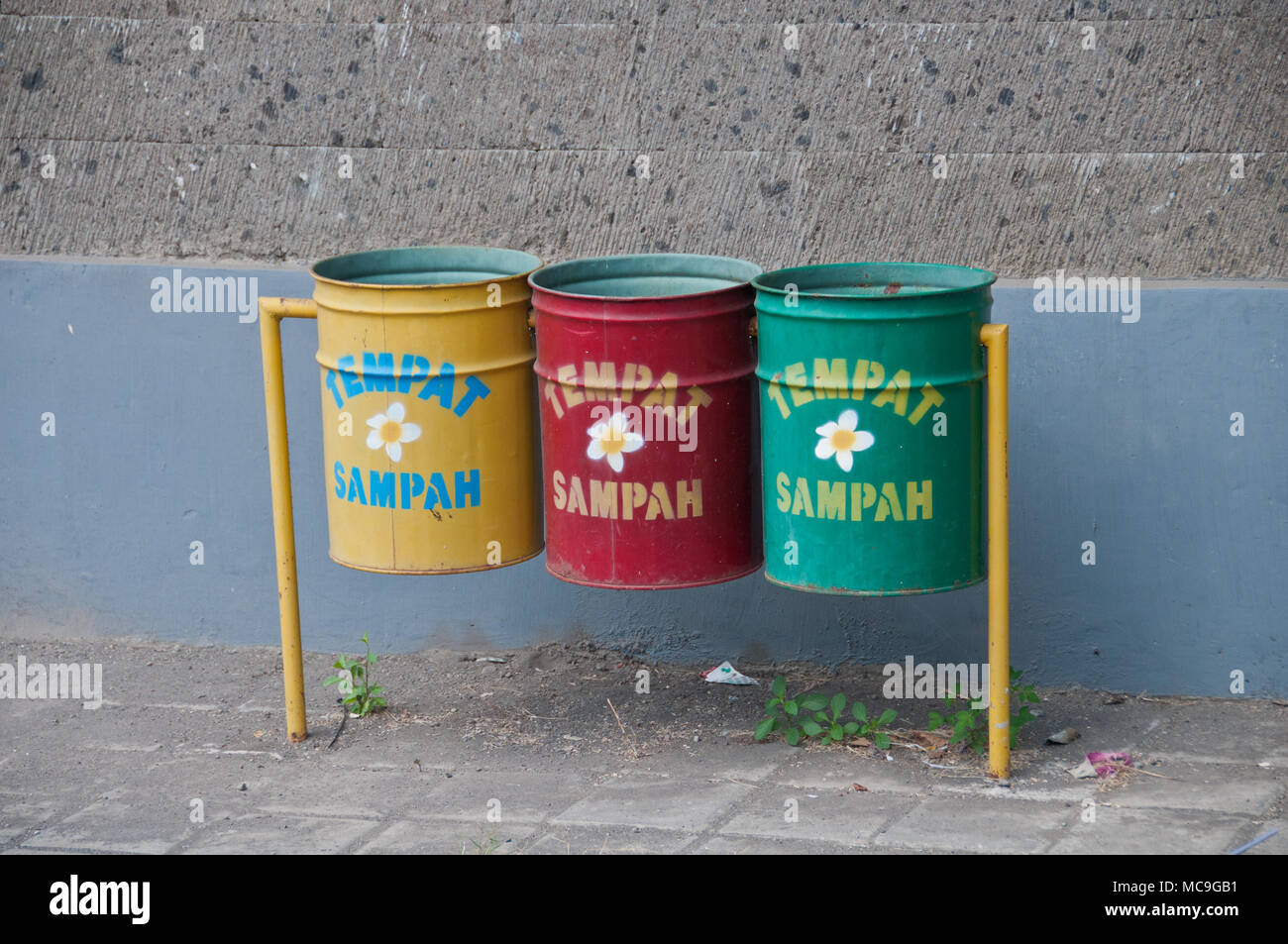 Three recycle bins in Bali. The word Tempat Sampah means Trash Can ...