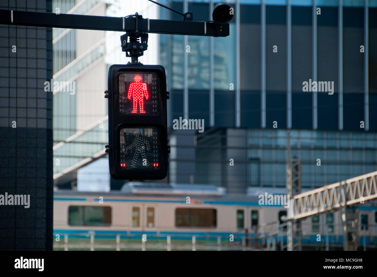 Red man stop traffic sign in front of Tokyo train station Stock Photo ...