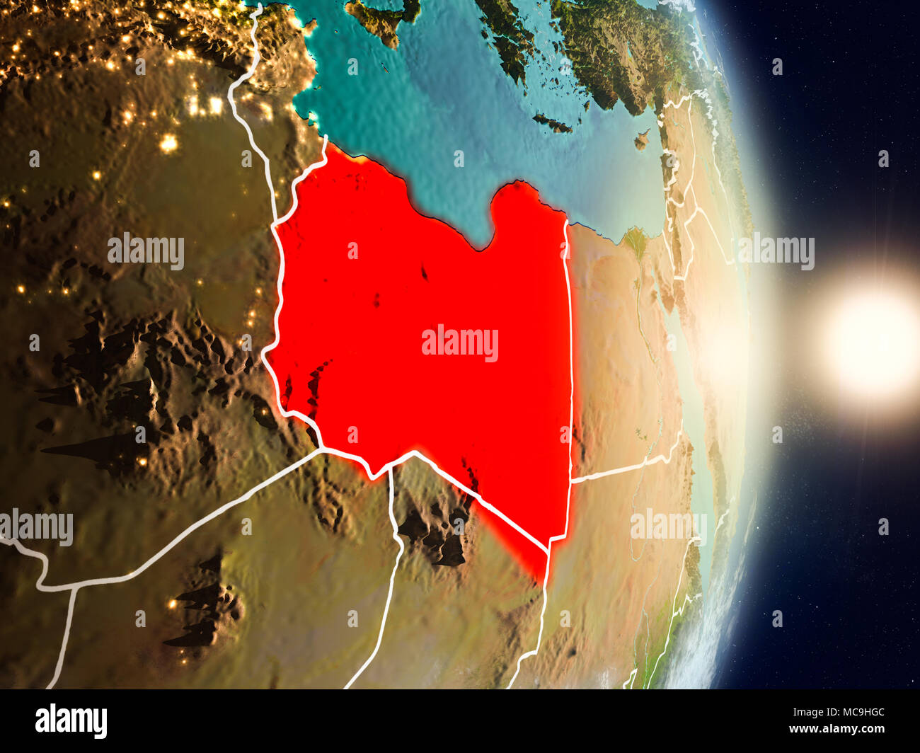 Libya during sunrise highlighted in red on planet Earth with visible ...