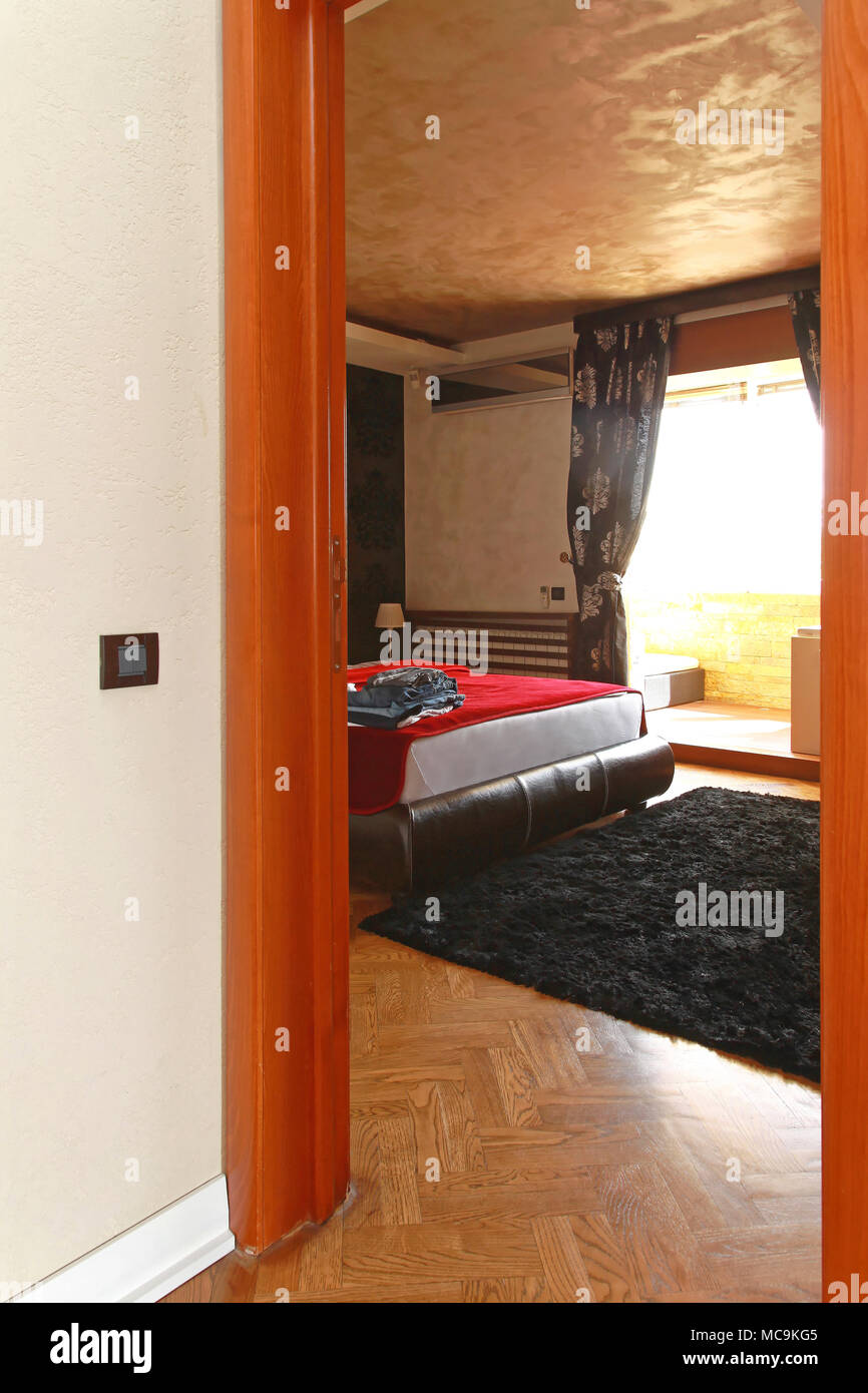Contemporary Bedroom Interior View Through Door Stock Photo - Alamy