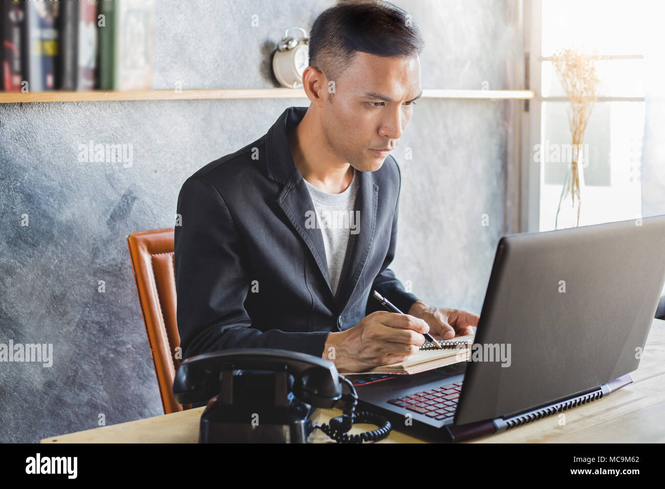 Business man working laptop documents hi-res stock photography and ...