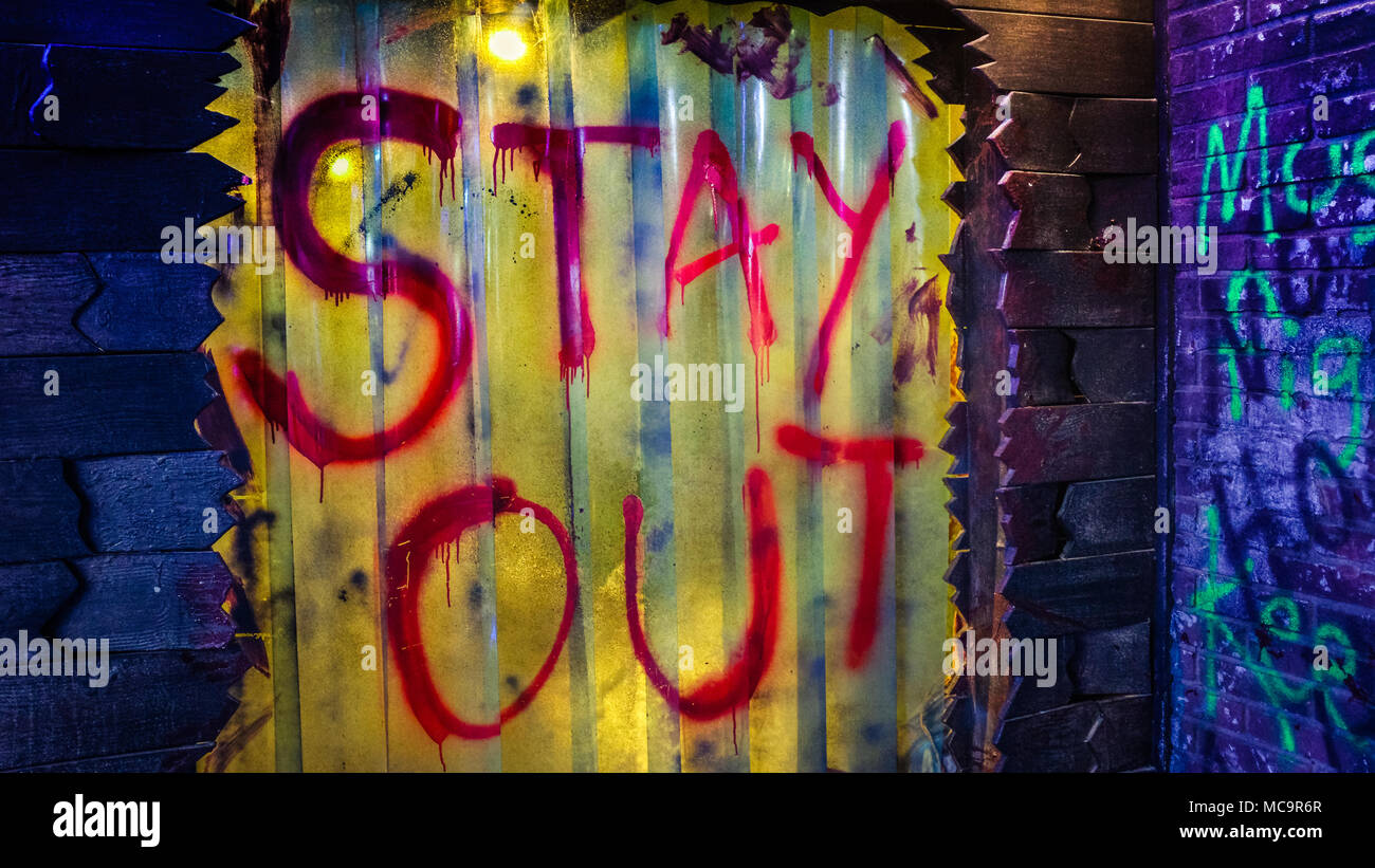 Scary stay out sign Stock Photo - Alamy