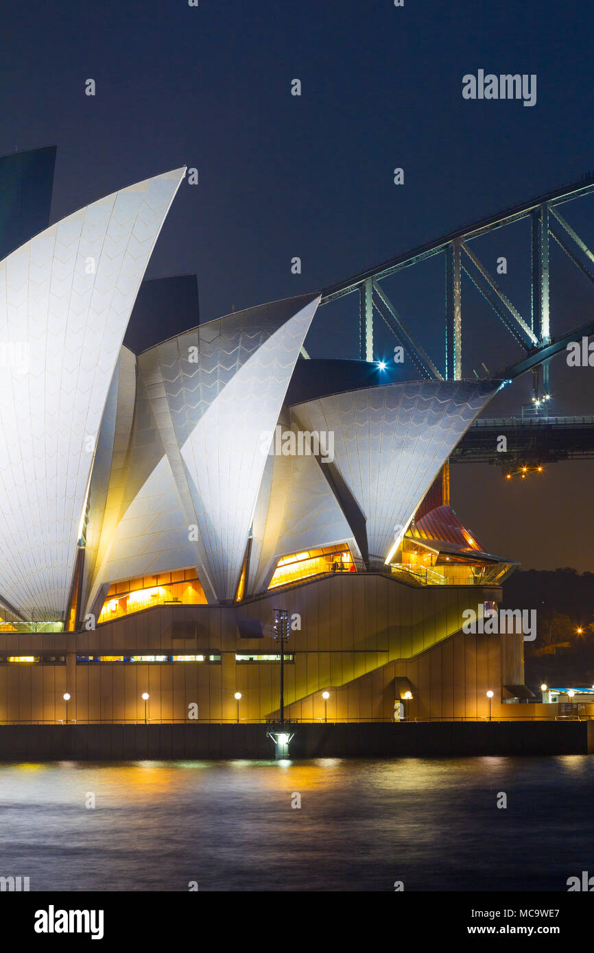 Night view of Sydney Opera House and Sydney Harbour Bridge in Australia ...