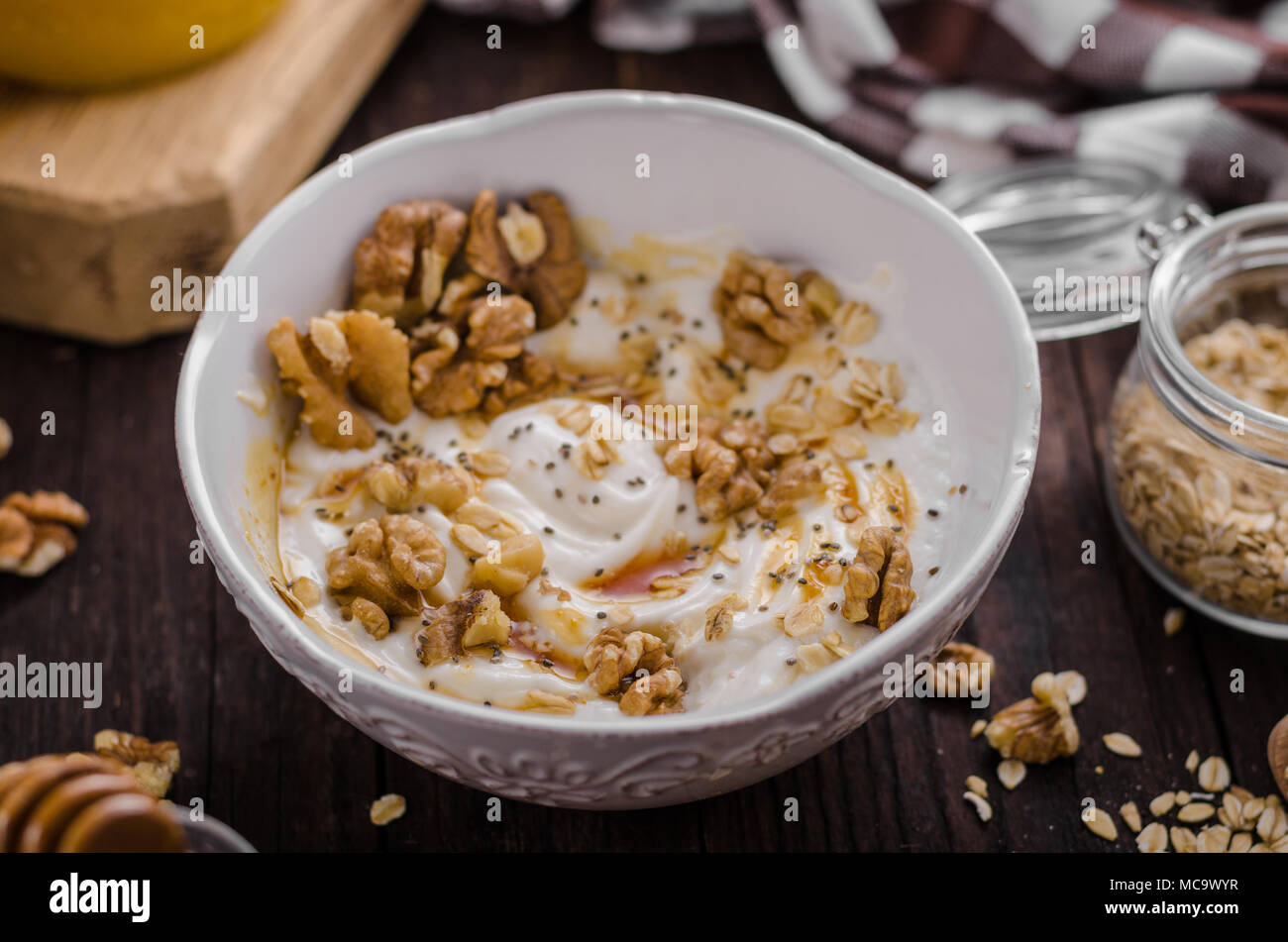 Fresh cheese with honey and walnuts, food photography, food stylind ...