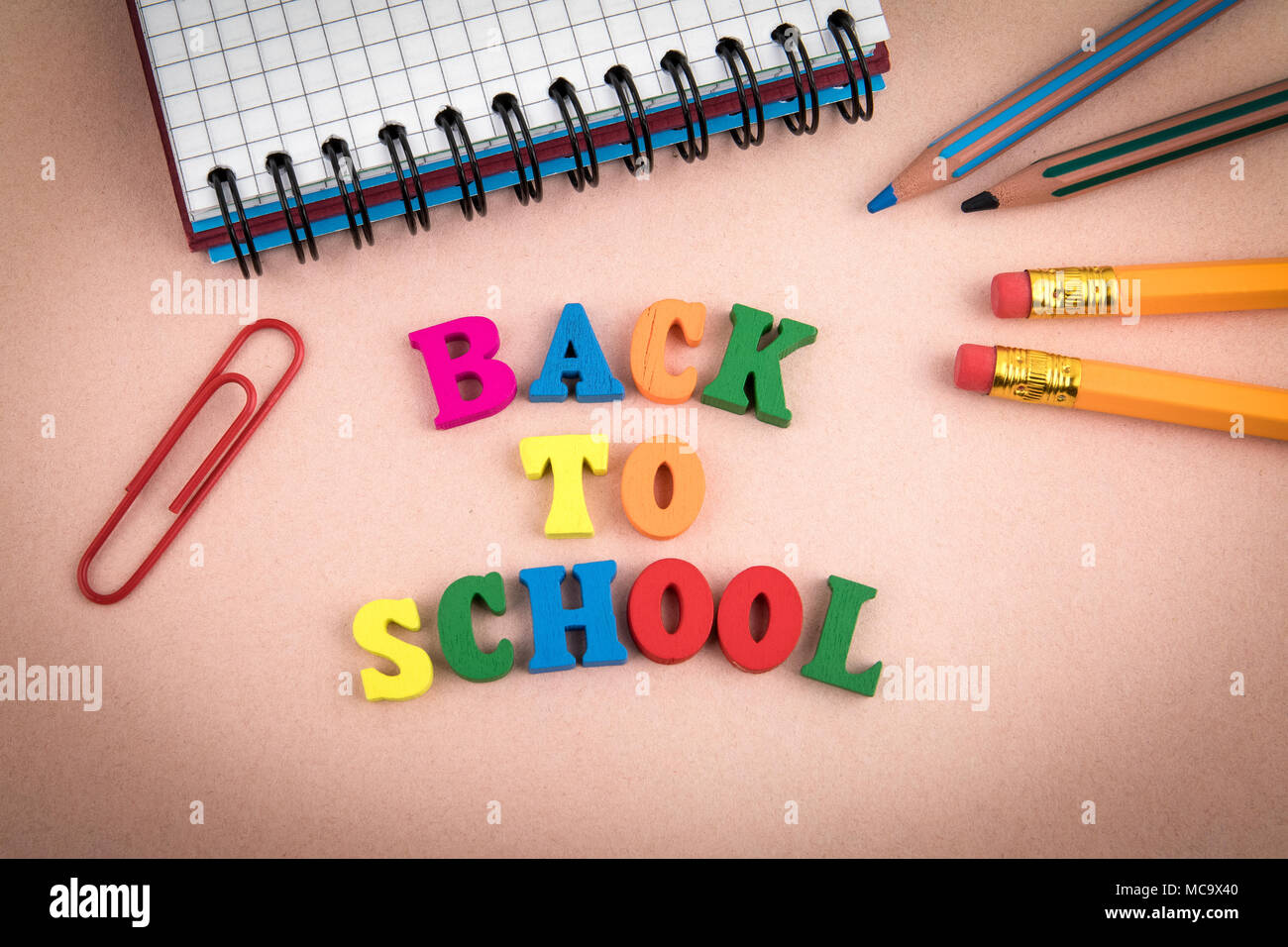 Back to school. Wooden letters on the office desk Stock Photo - Alamy