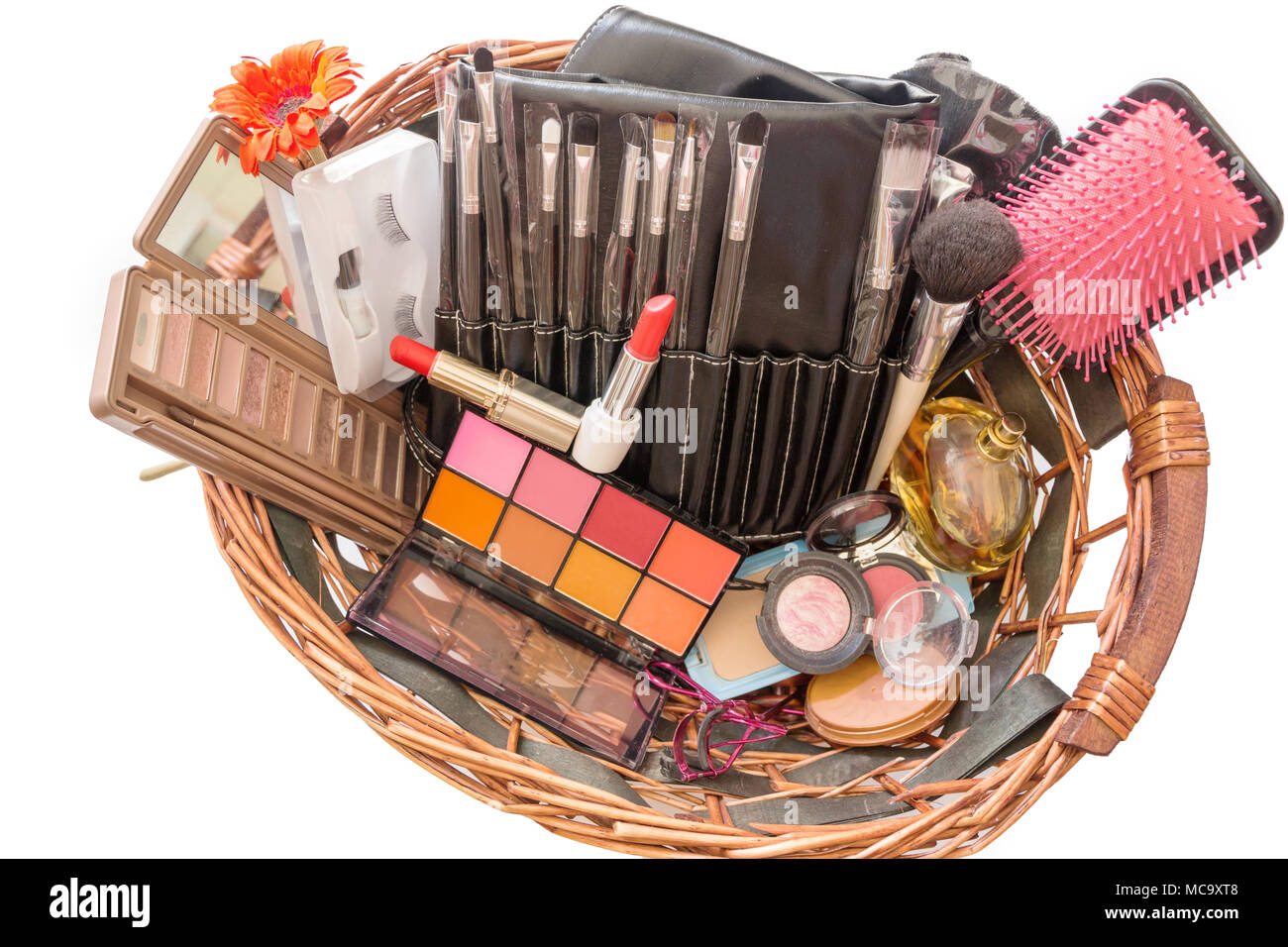 Basket full of Makeup Brushes, Makeup products with cosmetic background ...