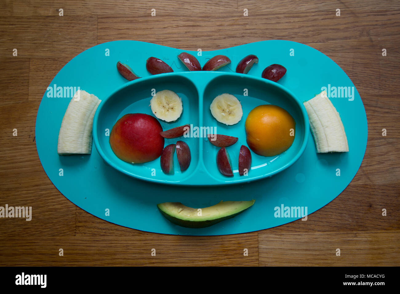 Baby weaning avocado hi-res stock photography and images - Alamy