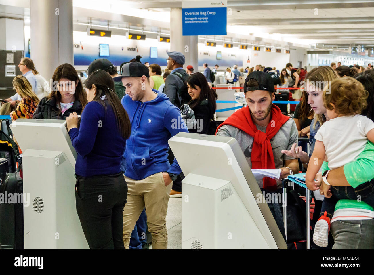 Airport self check in hispanic hi-res stock photography and images - Alamy