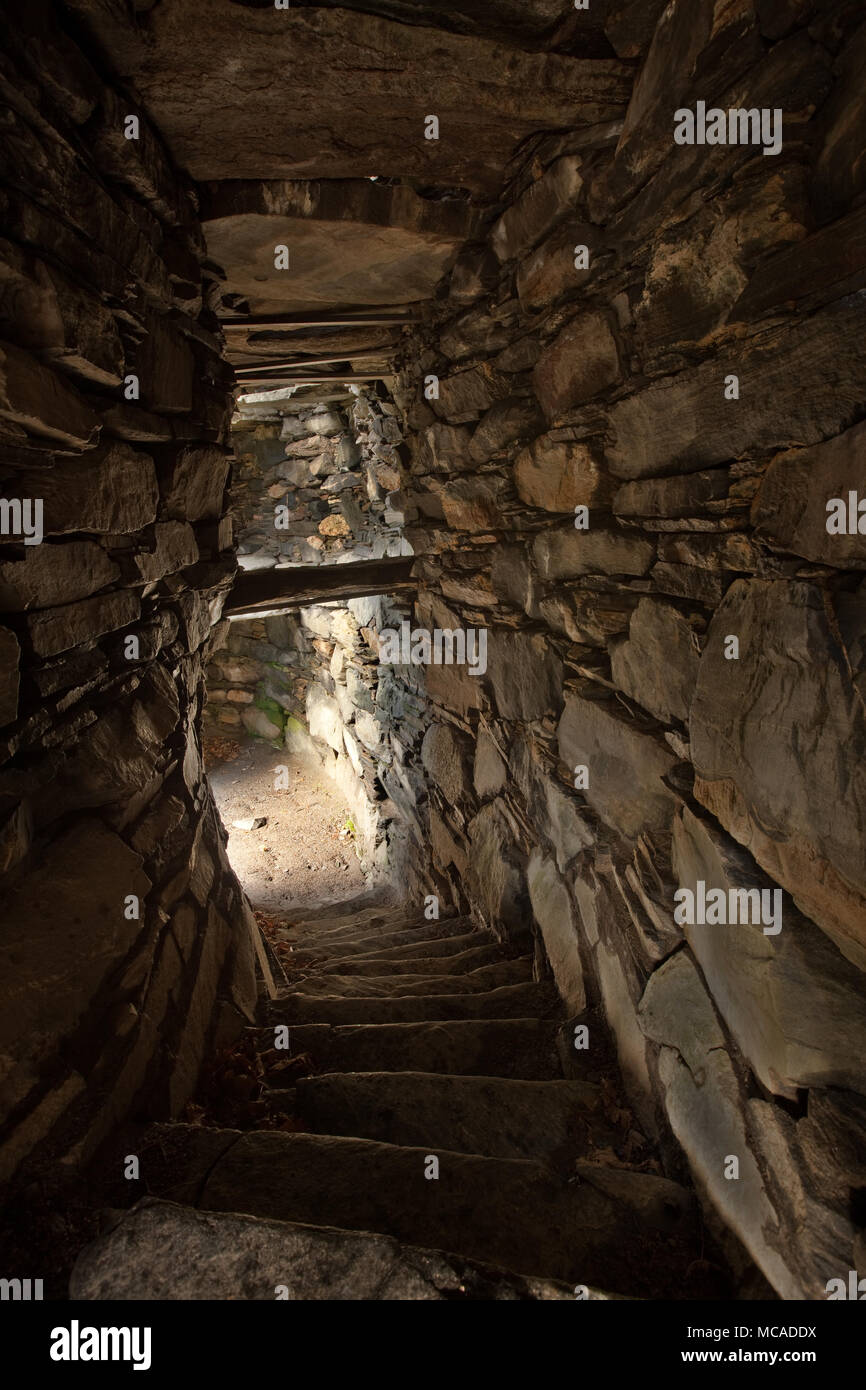 A stone lined staircase in Dun Troddan, an Iron-age Broch in Glenelg ...