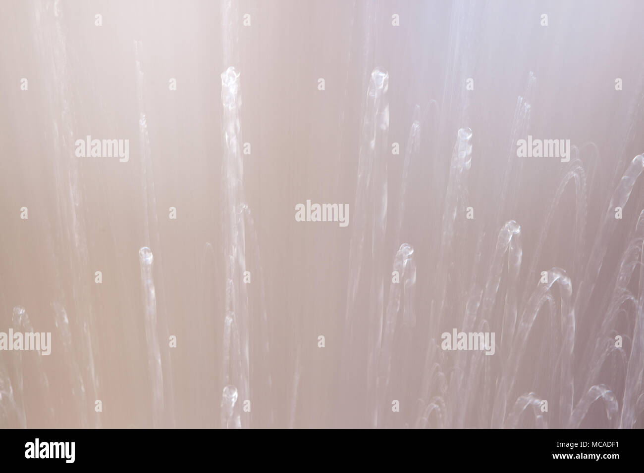 Abstract sprays of water rising from a water wheel Stock Photo - Alamy