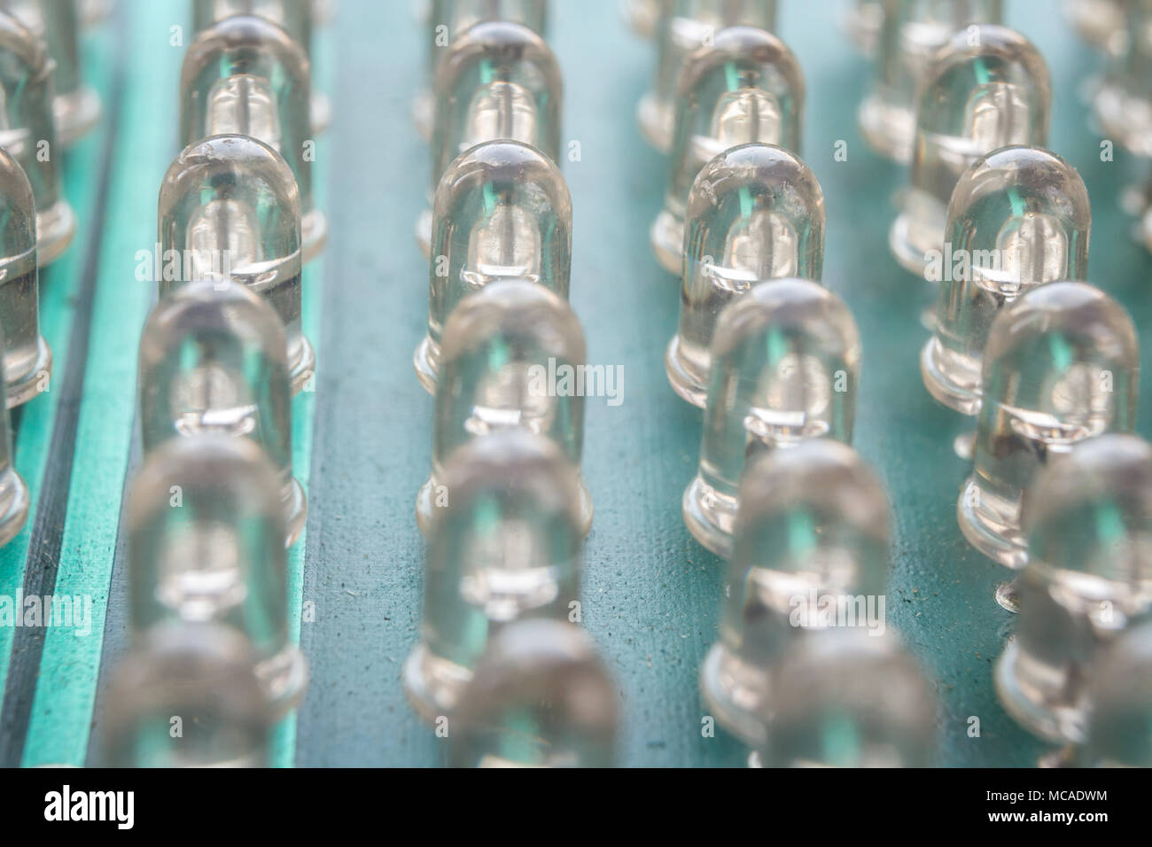 Chips, capacitors resistors on circuit board close up Stock Photo - Alamy