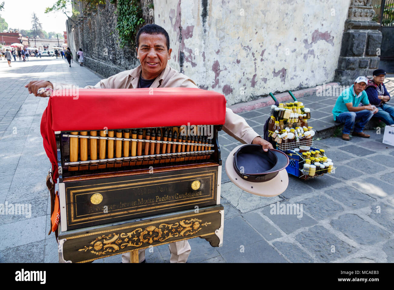 An organillero hi-res stock photography and images - Alamy