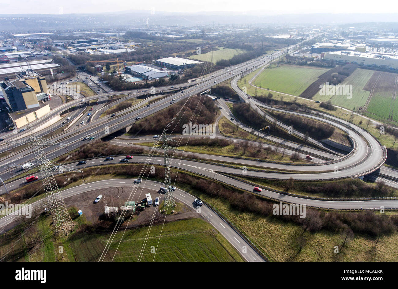 Aerial view of a highway intersection with a clover-leaf interchange in ...