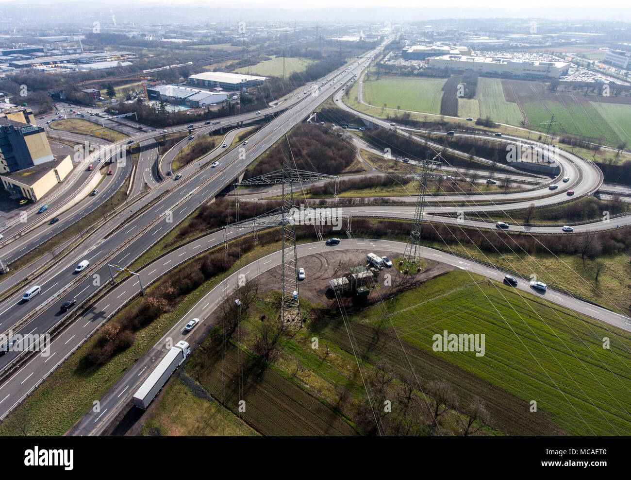 Aerial view of a highway intersection with a clover-leaf interchange in ...