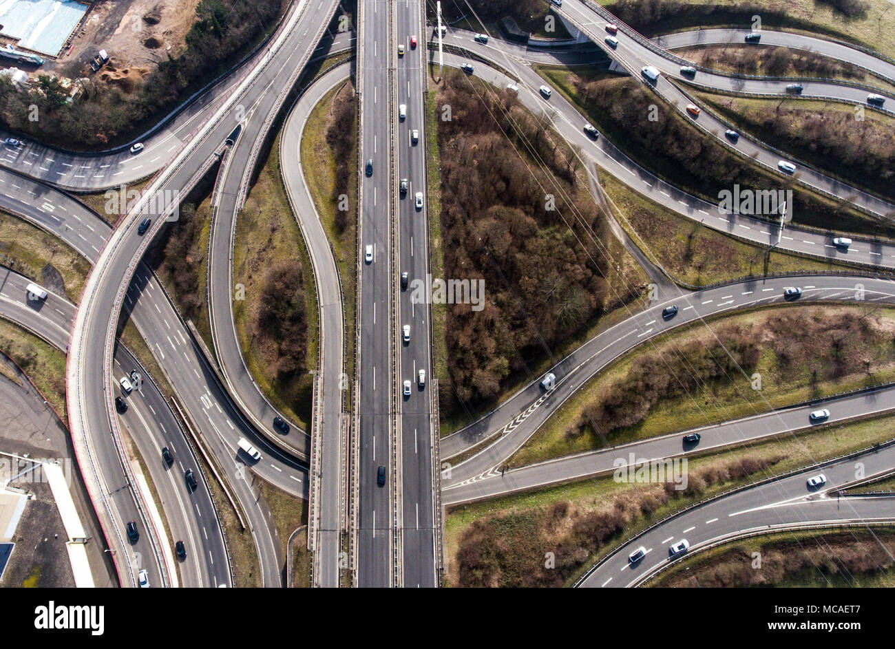 Aerial view of a highway intersection with a clover-leaf interchange in ...