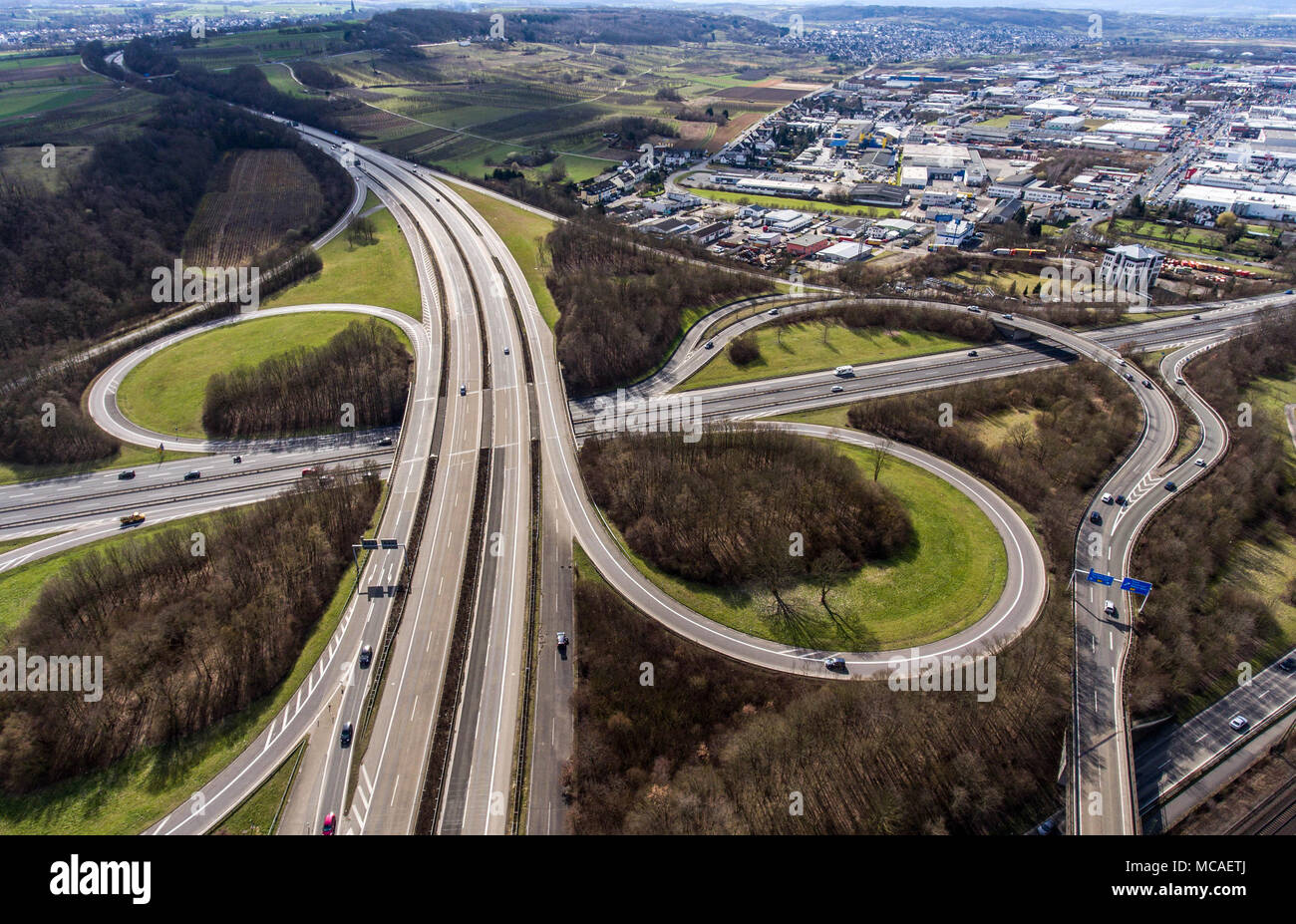 Aerial view of a highway intersection with a clover-leaf interchange in ...