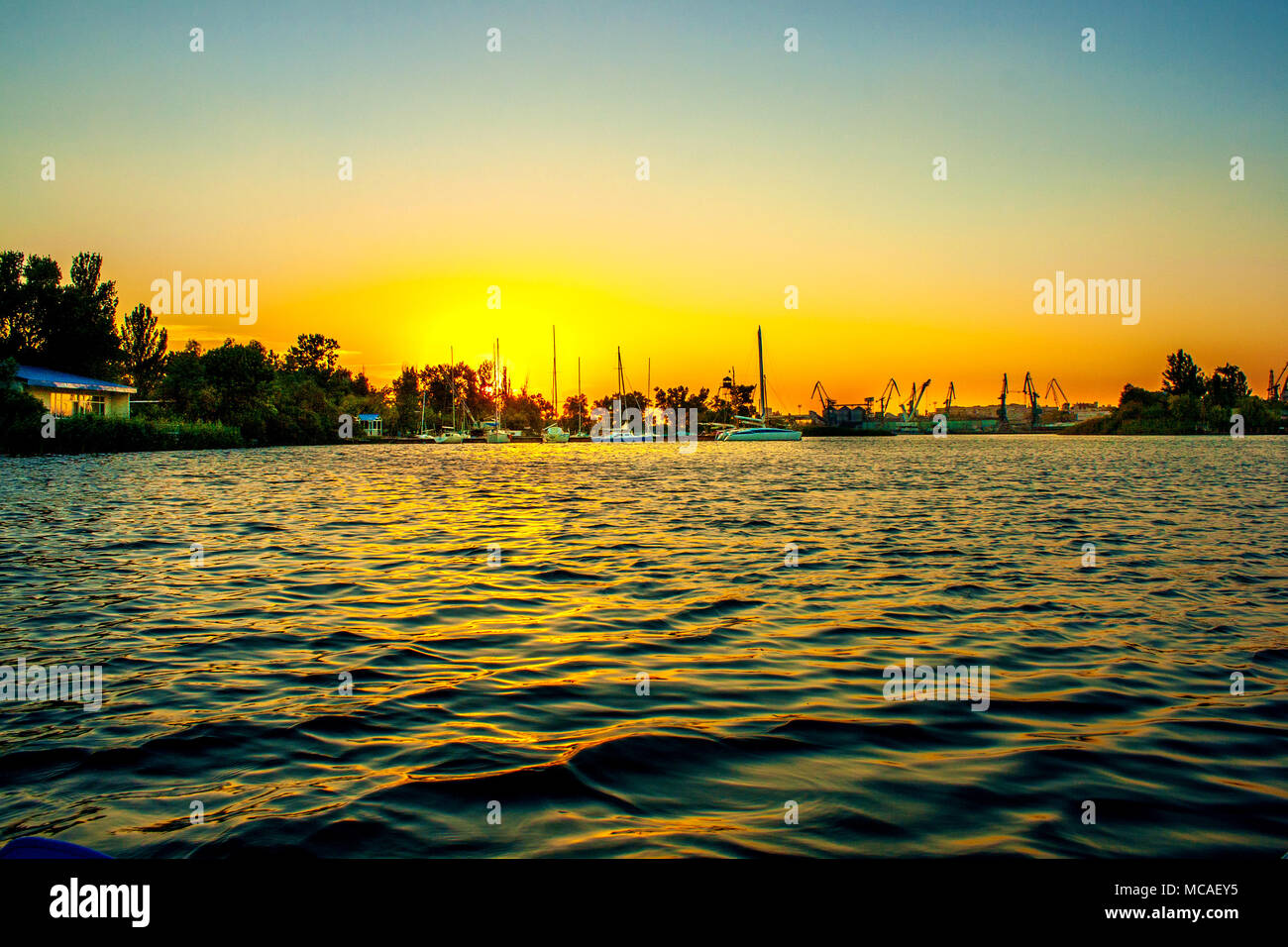 Yacht by the sunset hi-res stock photography and images - Alamy
