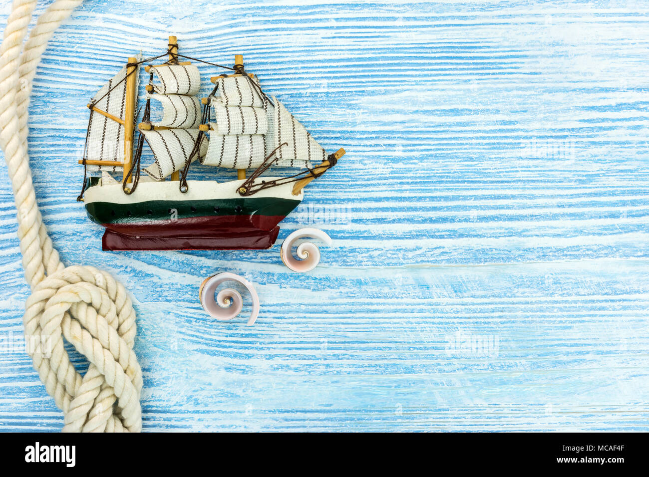 composition with seashells, ship and rope. ocean theme. summer ...