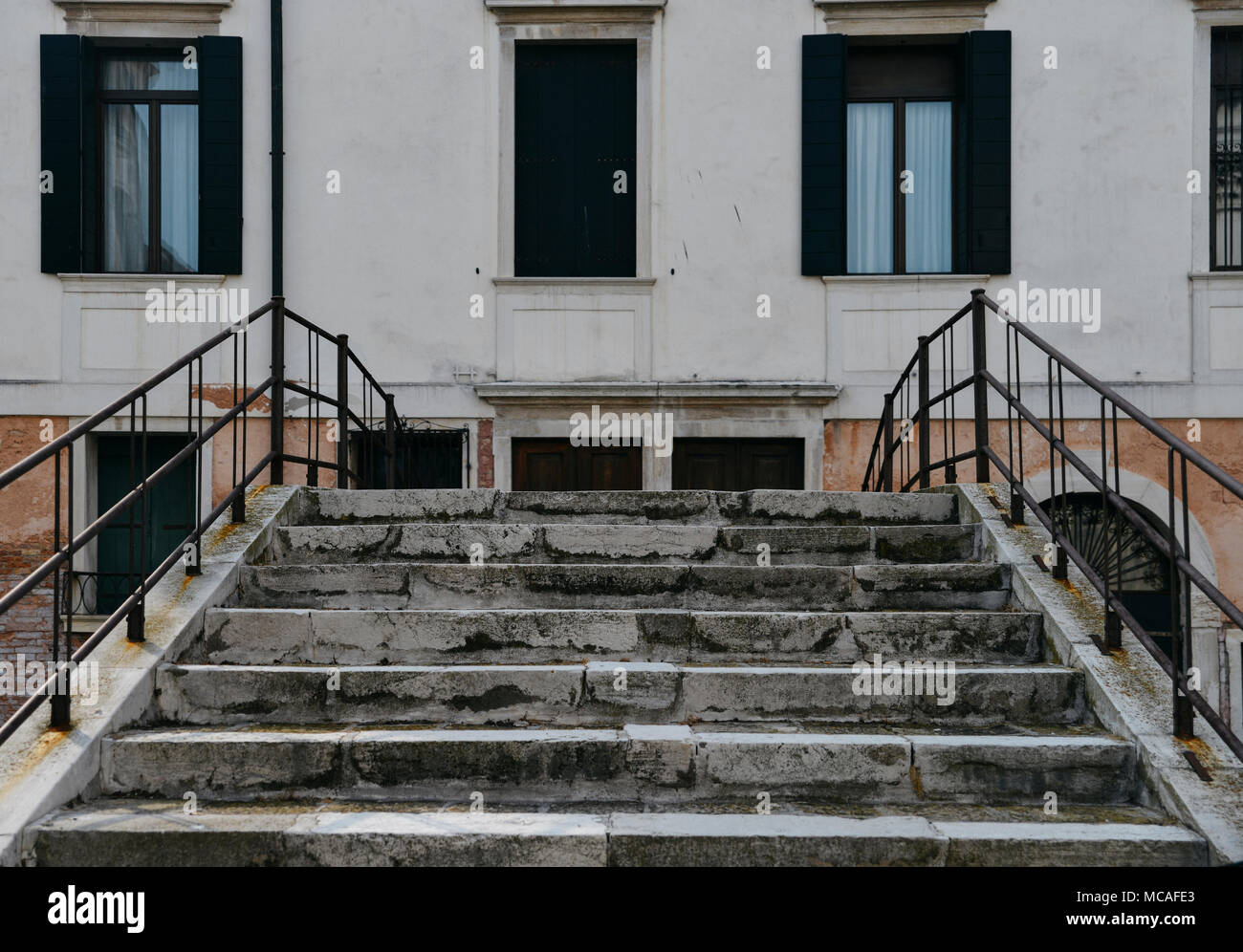 Horizontal view of bridge leading to historic building in Venice, Italy ...