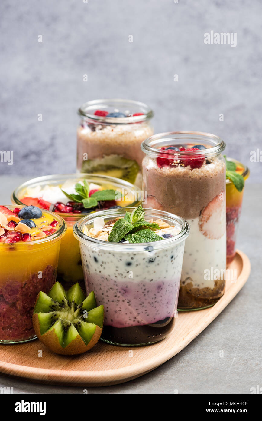 Ripe fruits and superfoods jars, layered food Stock Photo - Alamy