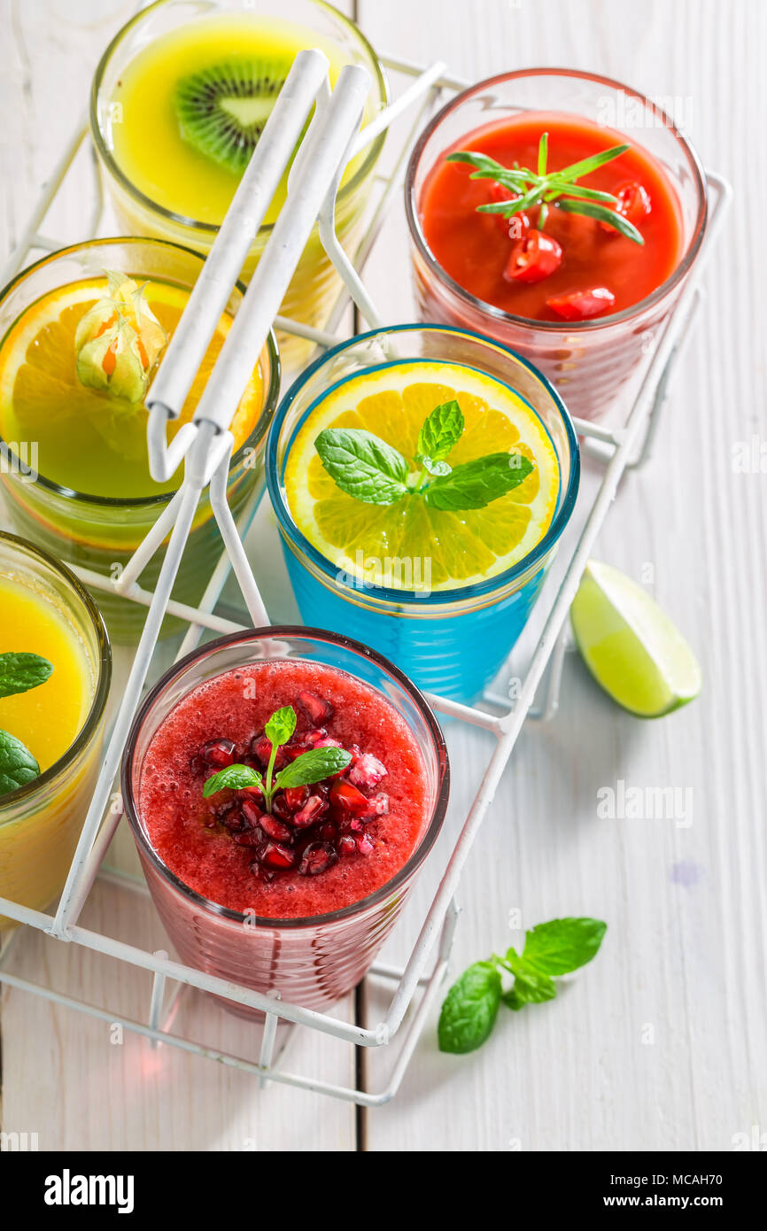 Tasty smoothie with fresh fruits in white basket Stock Photo - Alamy
