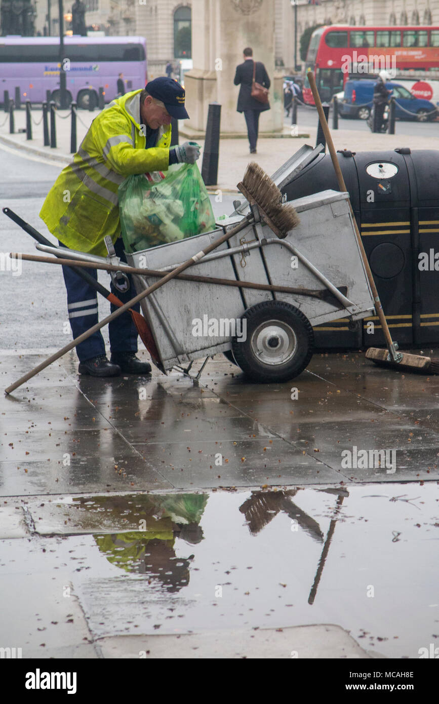 Workman cleaning pavement hi-res stock photography and images - Alamy