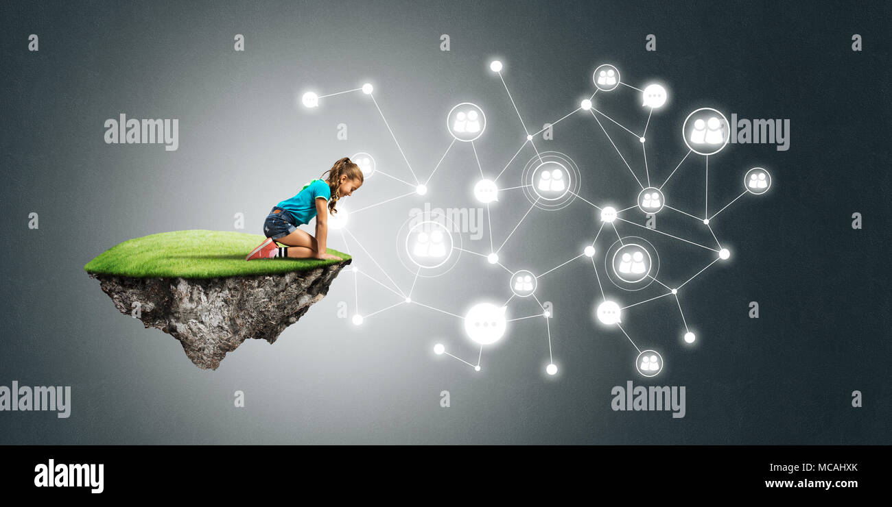 Concept of careless happy childhood with girl looking down Stock Photo ...