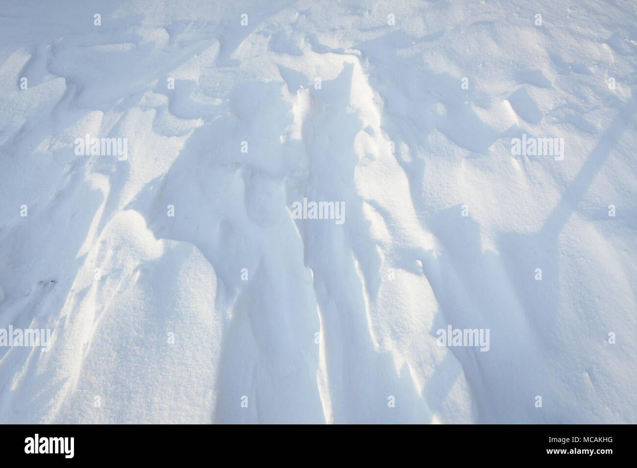 Wind patterns in snow Stock Photo - Alamy