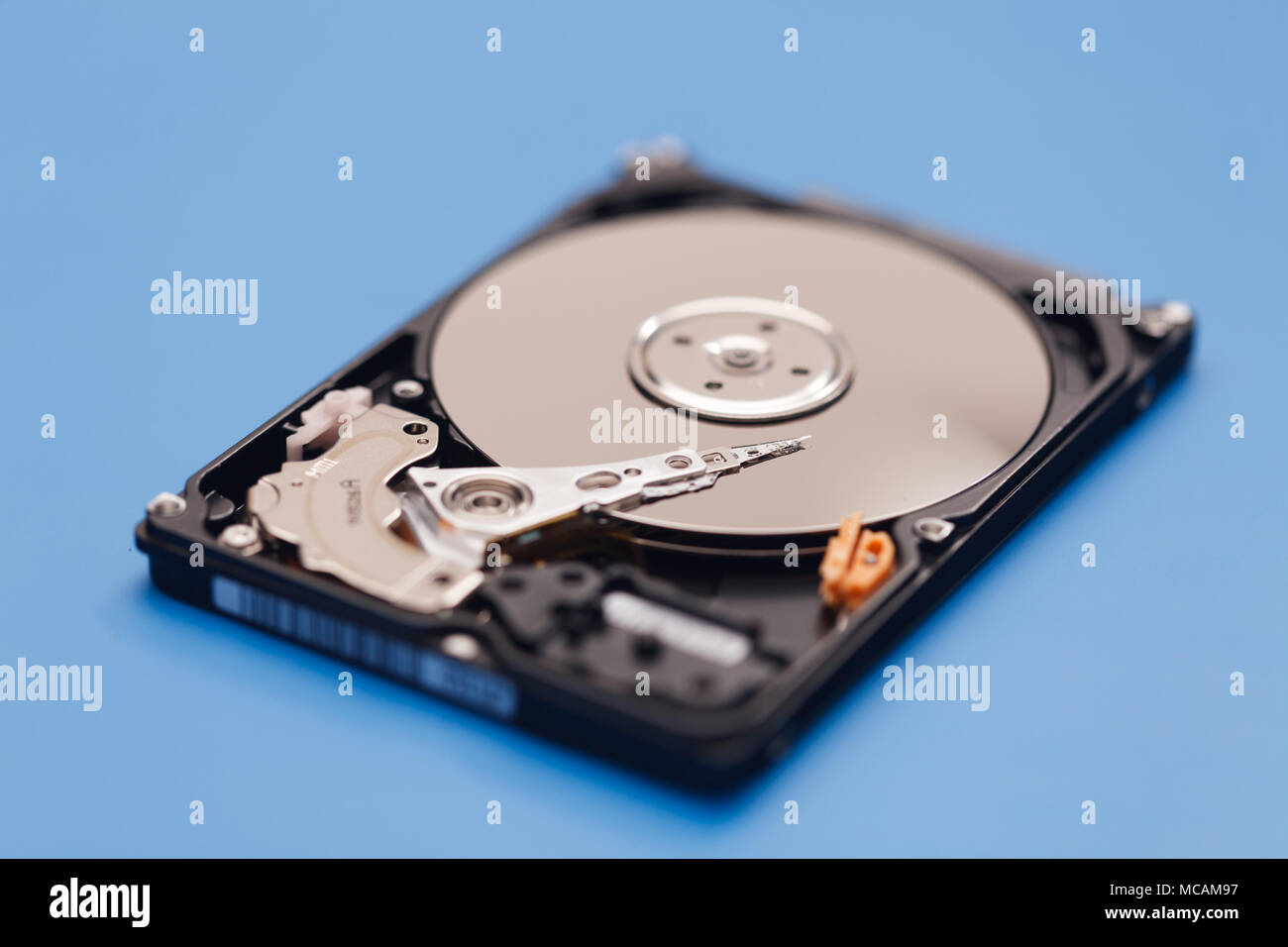 Open HDD on a blue background Stock Photo - Alamy