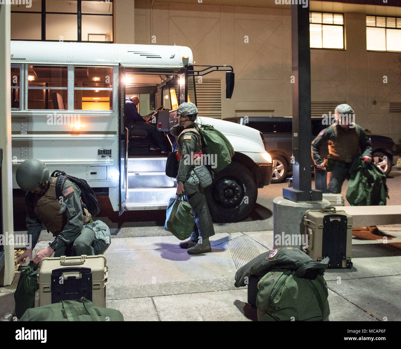 Aircrew members assigned to the 22nd Airlift Squadron prepare to board ...