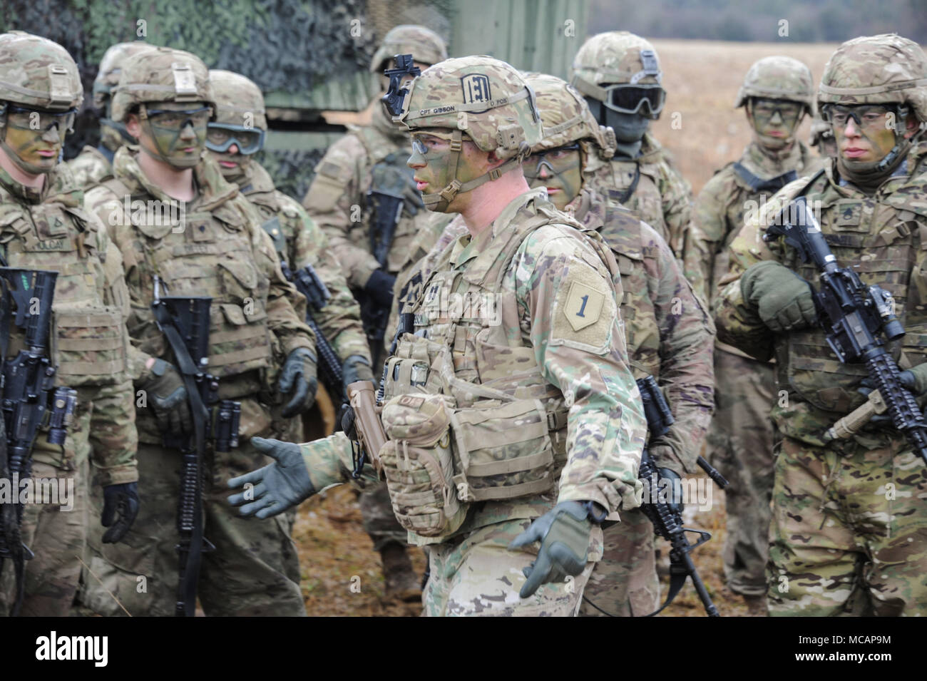 U.S. Army Cpt. Jordan Gibson, center, commander of Battery A, 1st ...
