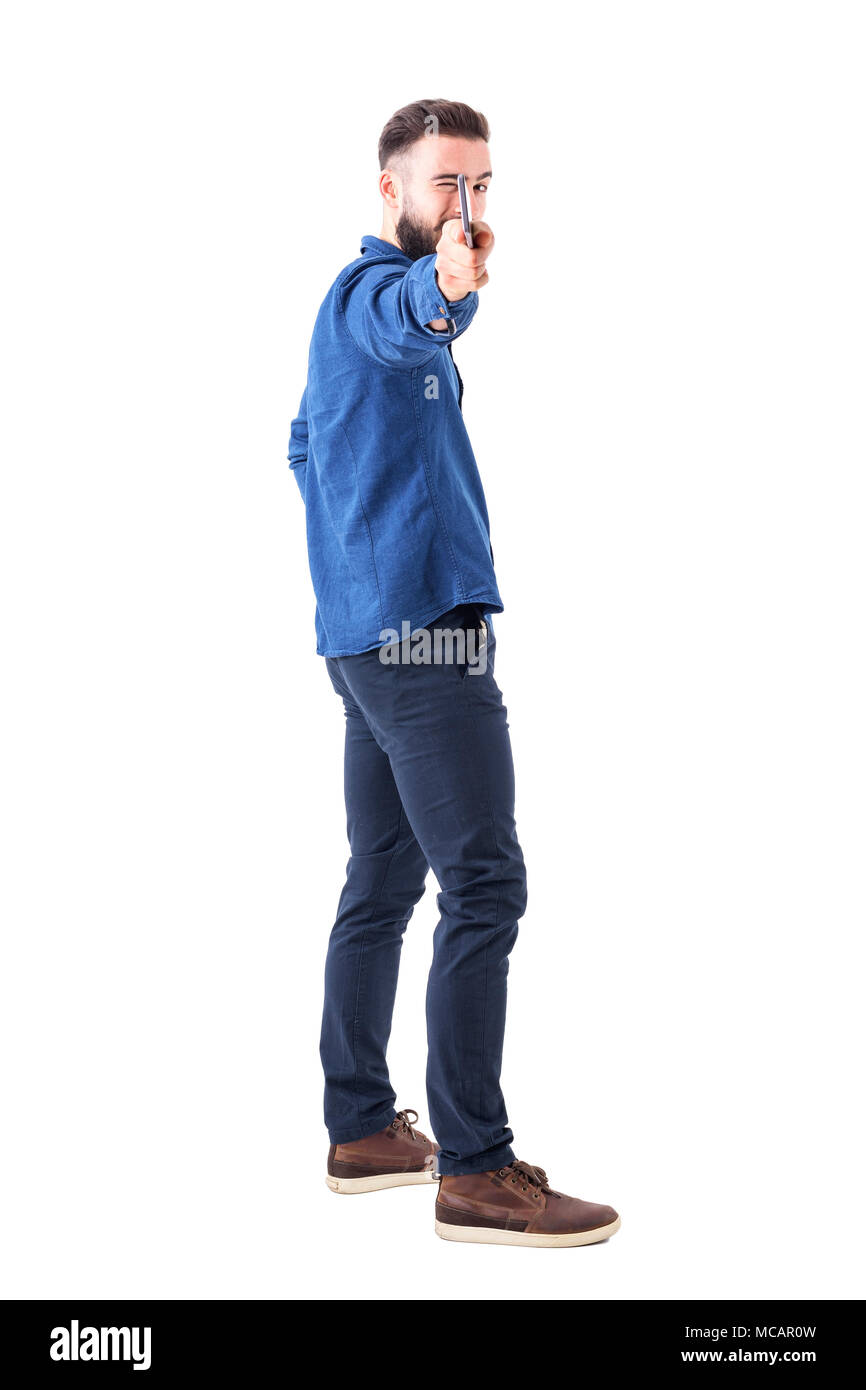 Man pretending to shoot pistol Cut Out Stock Images & Pictures - Alamy