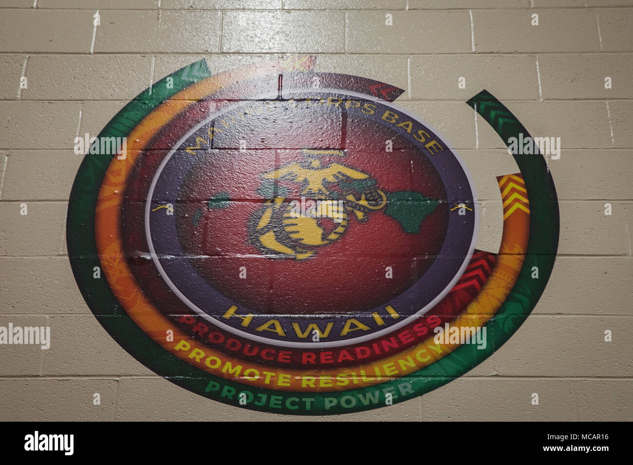 The Marine Corps Base Hawaii logo is printed onto the wall of the base ...