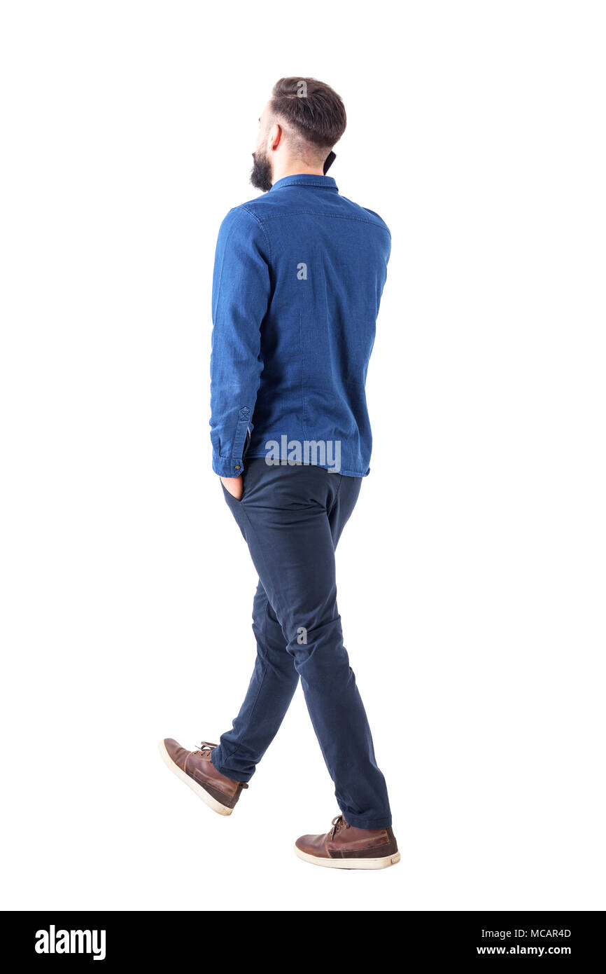 Side back view of young smart casual business man talk on the cellphone ...