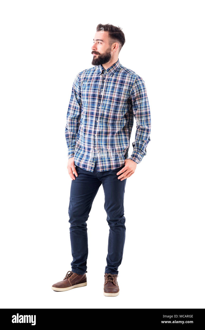 Confident relaxed bearded handsome fashion model in plaid shirt with ...