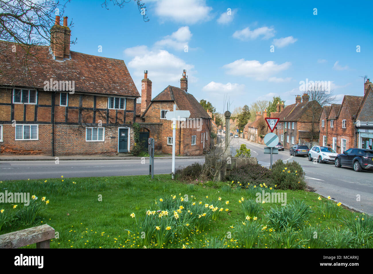 Aldermaston village in Berkshire, UK, with spring flowers and blue sky ...