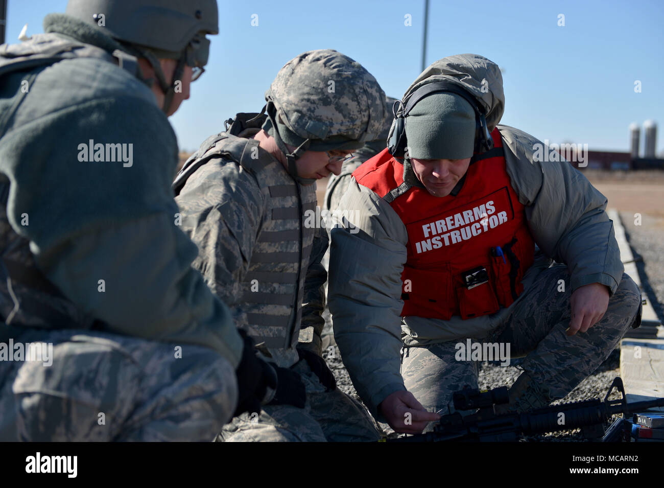 Staff Sgt. Dillon Greenlee, a Combat Arms Training Maintenance firearms ...