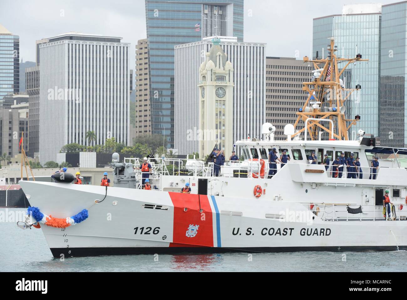 The Coast Guard Cutter Joseph Gerczak (WPC 1126) passes by Aloha Tower ...
